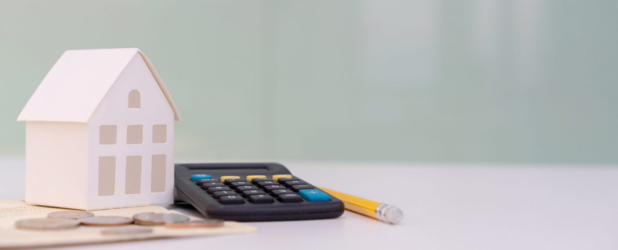 close up house's model on banking account book with calculator, coin ...